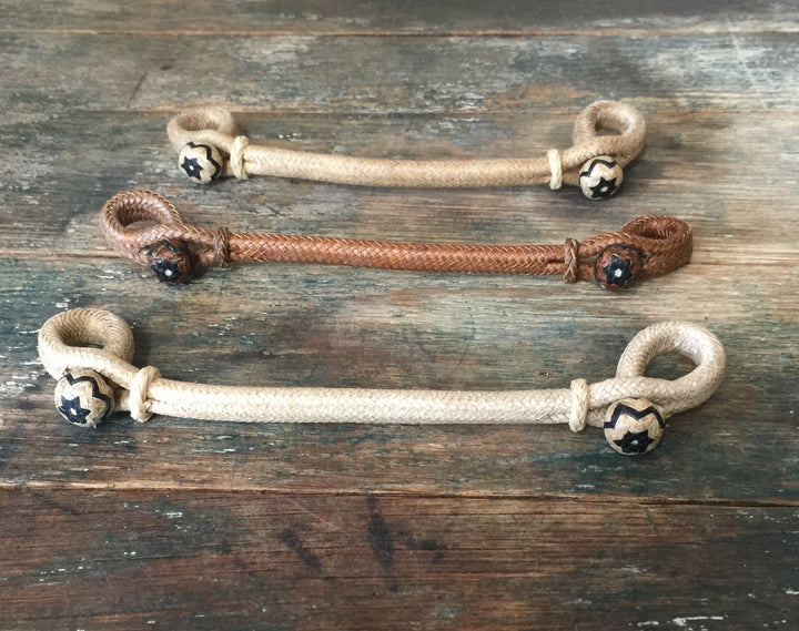 Bit Hobbles & Curbs – Traditional Rawhide Braiders